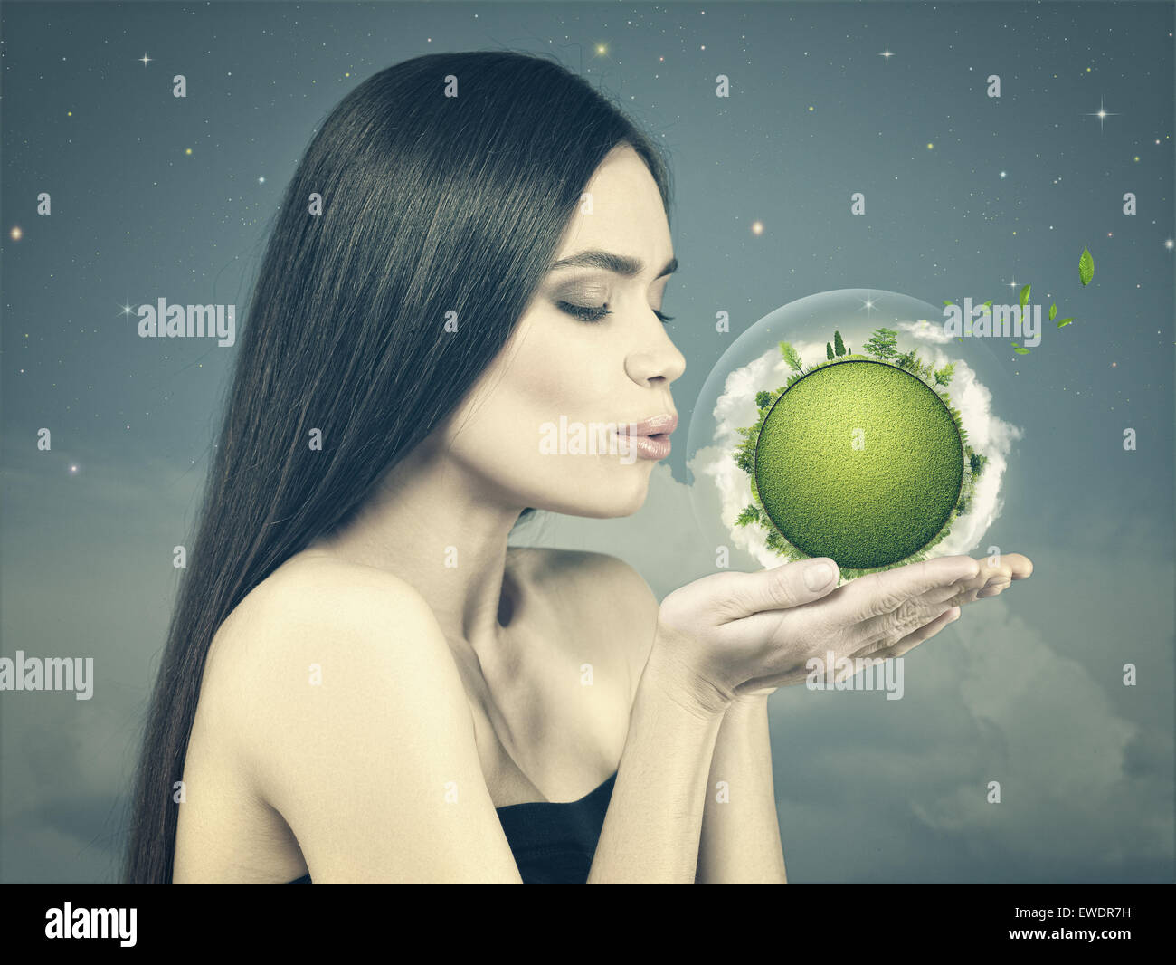 Woman holding planet earth hi-res stock photography and images - Alamy