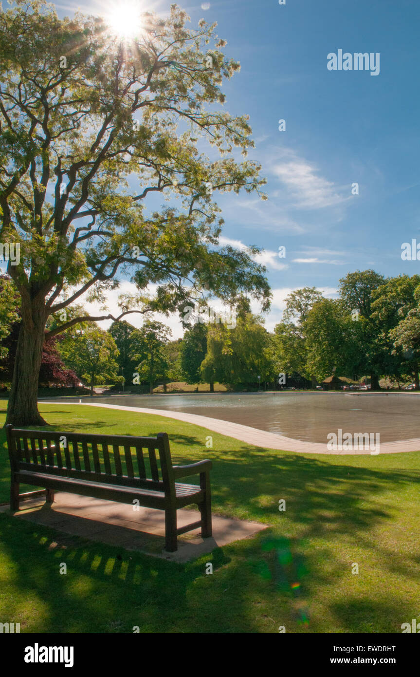 Beautiful tree-lined clean Tettenhall paddling pool on a bright sunny ...