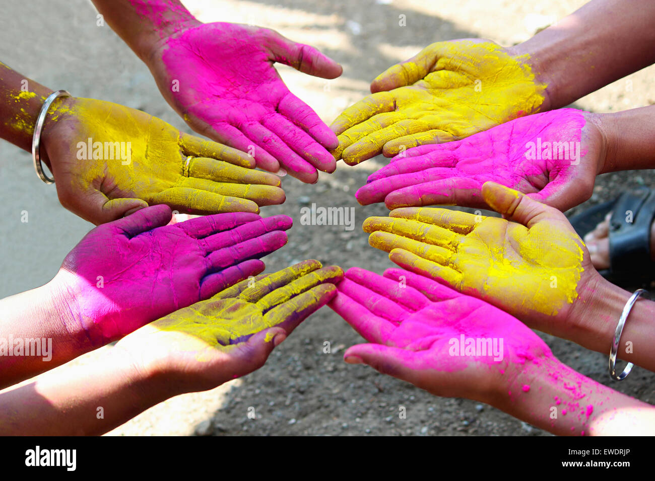 Colored powder on hands. Holi - the festival of colors Stock Photo - Alamy