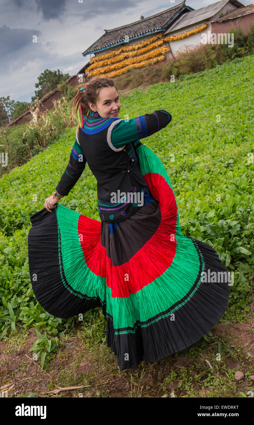 Woman in national costume with family Stock Photo - Alamy