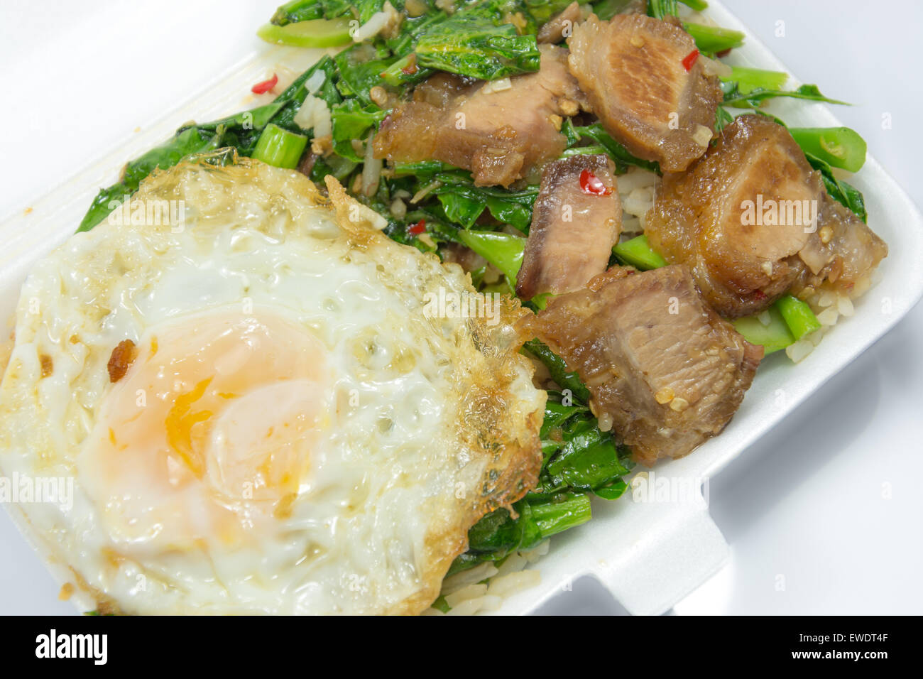 Thai fast food menu, deep fried streaky pork with kale and steamed rice ...