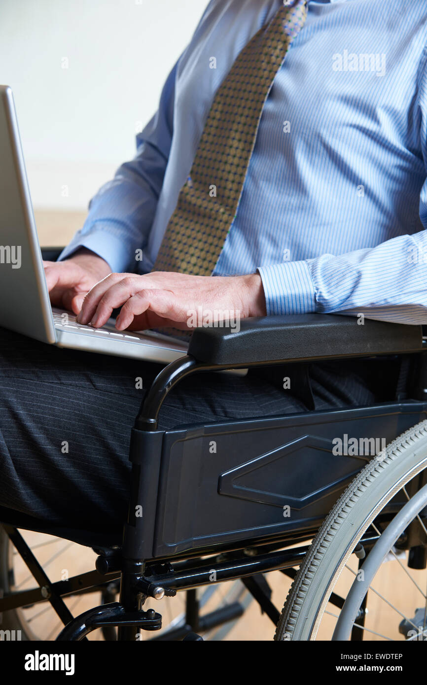 Disabled man using computer typing hi-res stock photography and images ...
