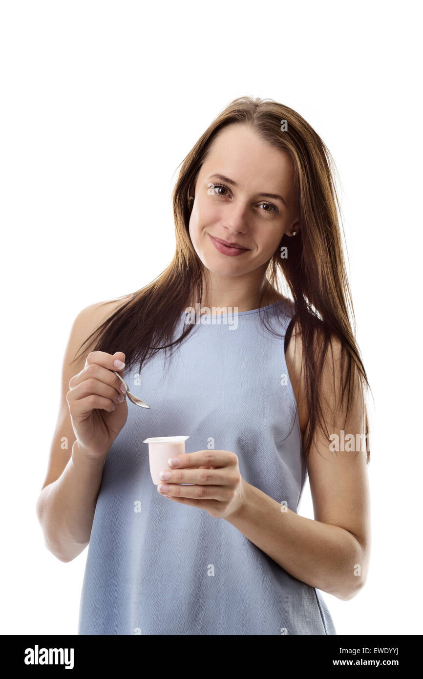 young woman eating yogurt Stock Photo - Alamy