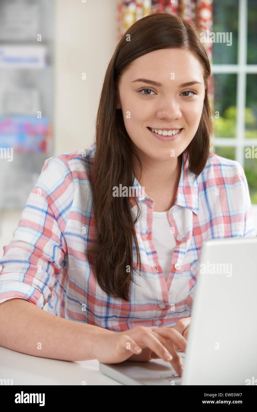Portrait Of Teenage Girl Using Laptop At Home Stock Photo - Alamy