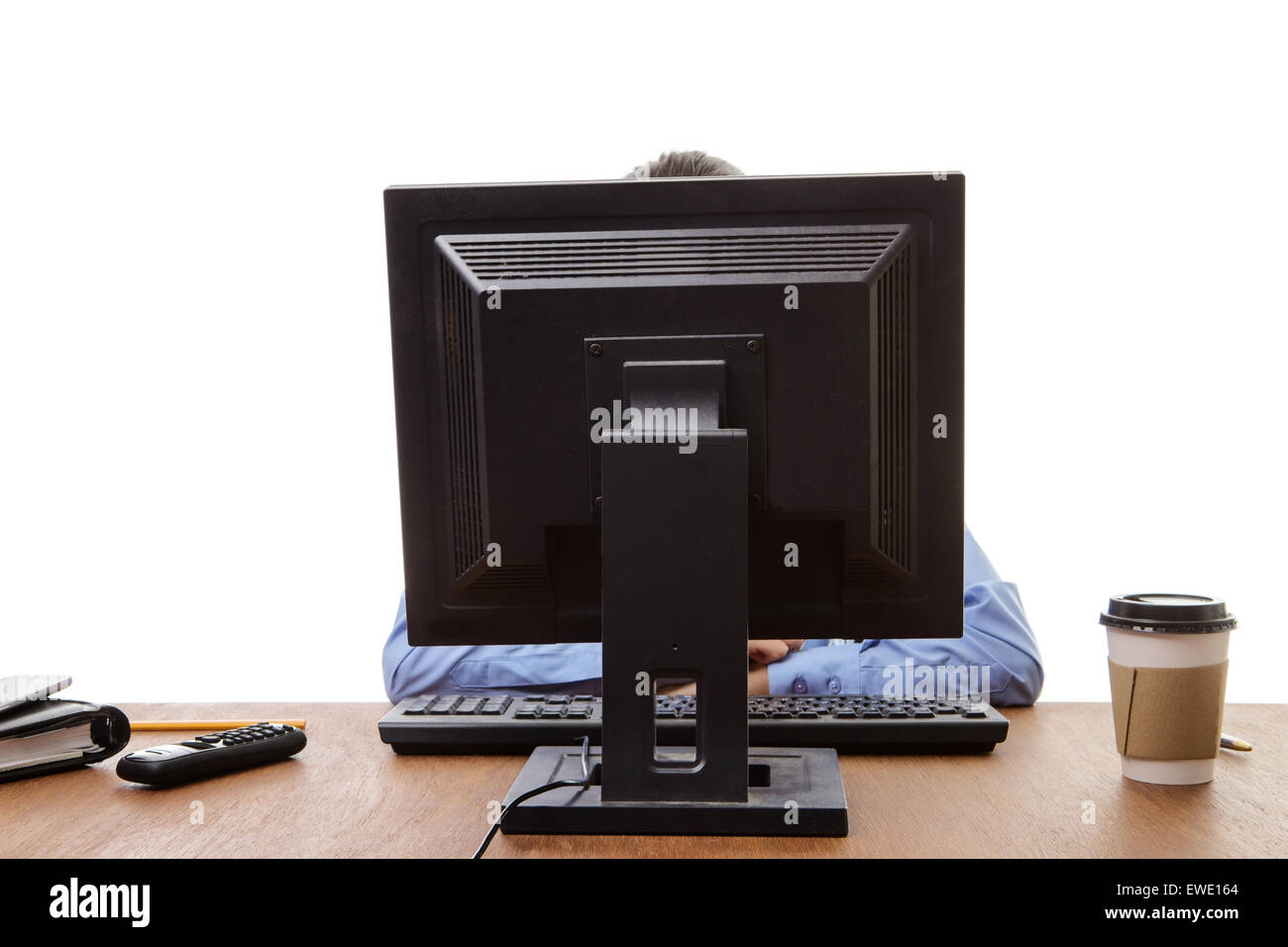 woman sitting behind a computer screen Stock Photo - Alamy