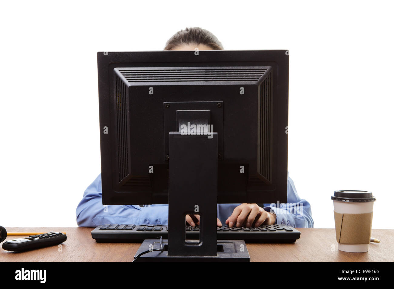 woman sitting behind a computer screen Stock Photo - Alamy