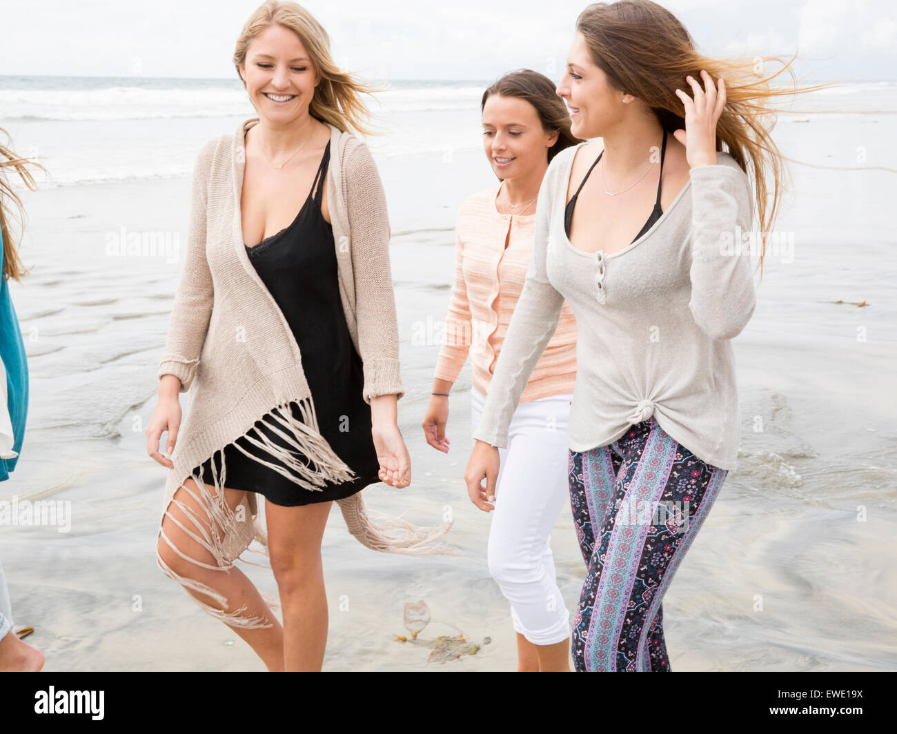 Three friends on beach hi-res stock photography and images - Alamy