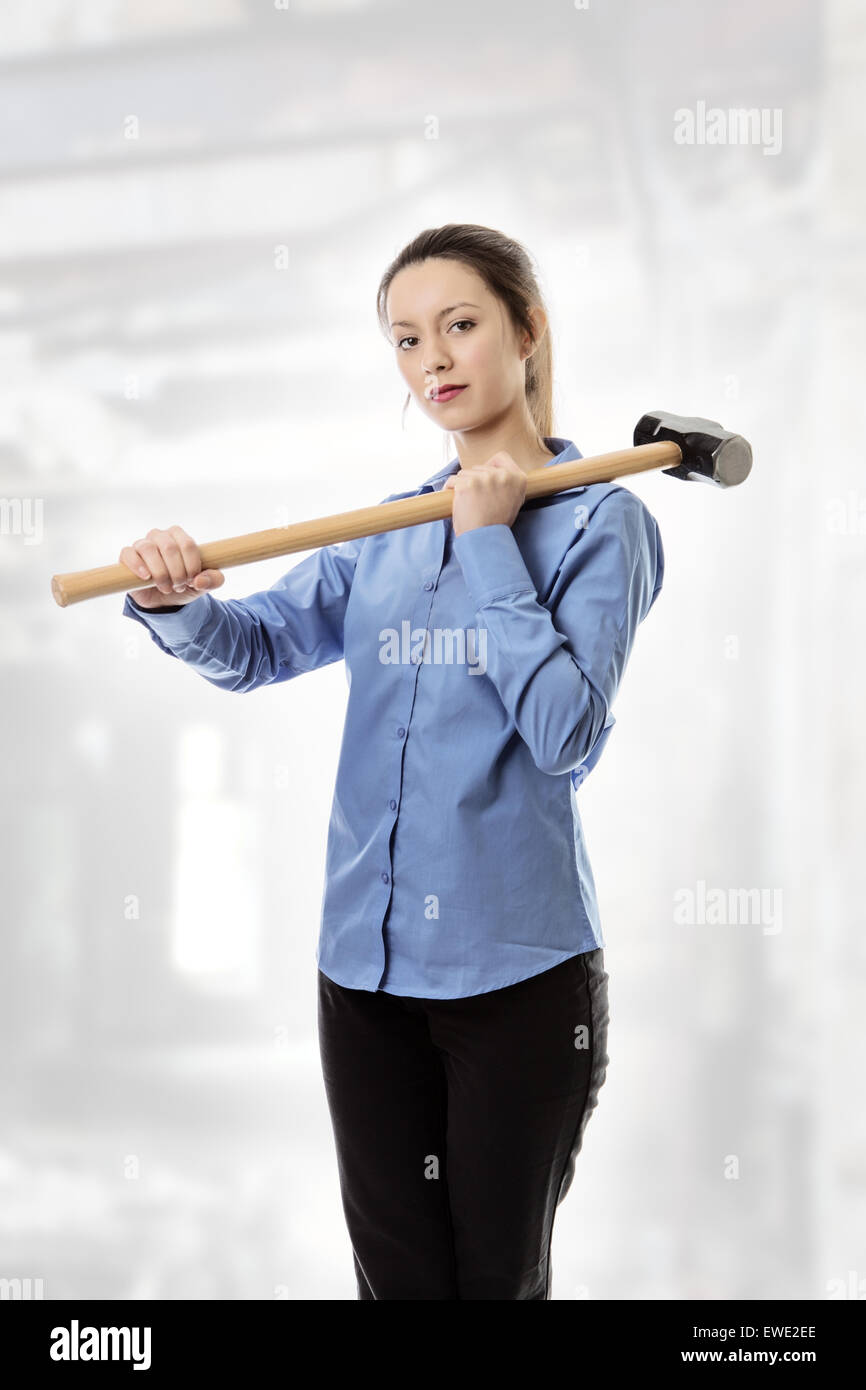 Woman sledge hammer hi-res stock photography and images - Alamy