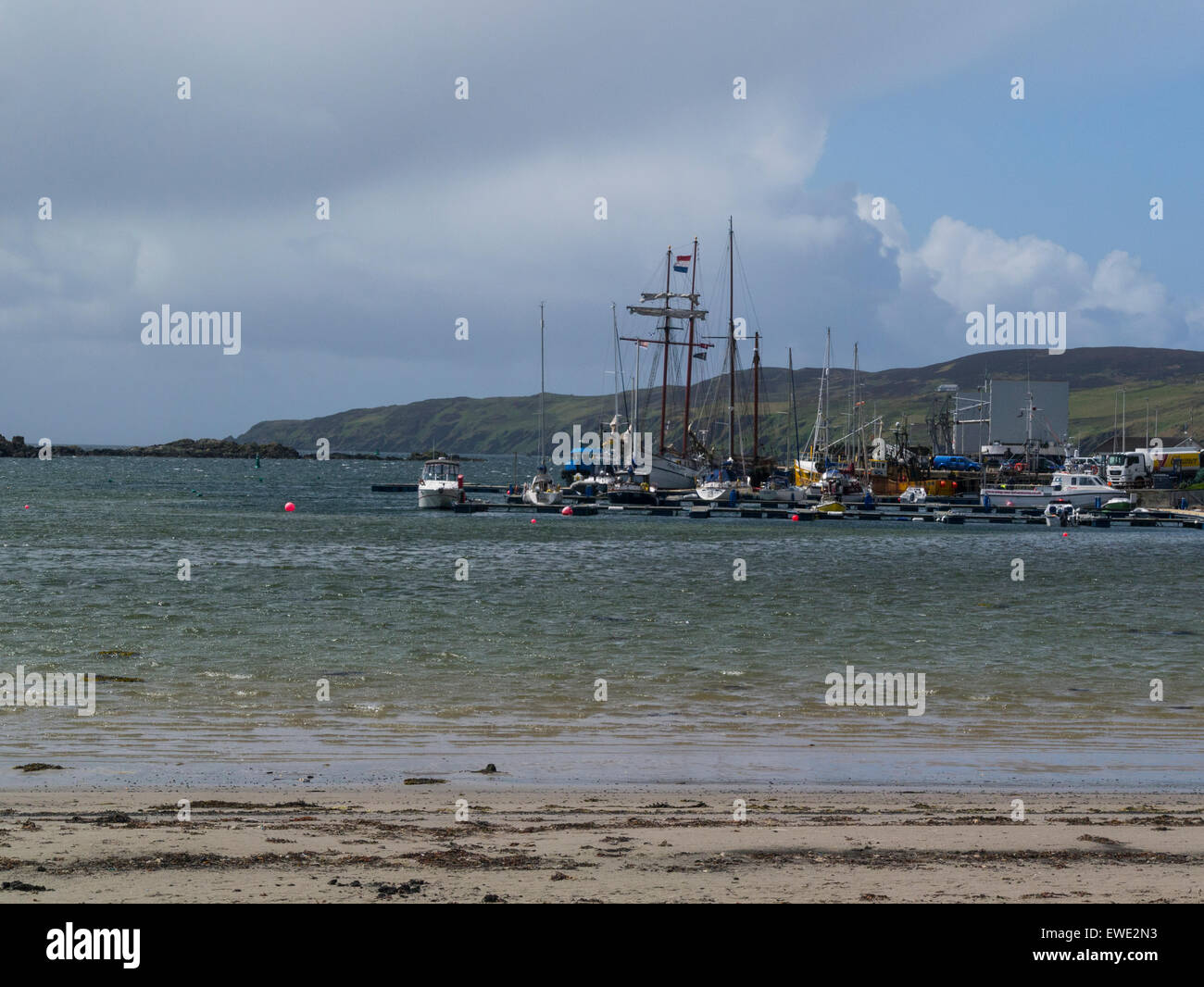 View across Leomadais Bay to Port Ellen harbour Isle of Islay Argyll ...