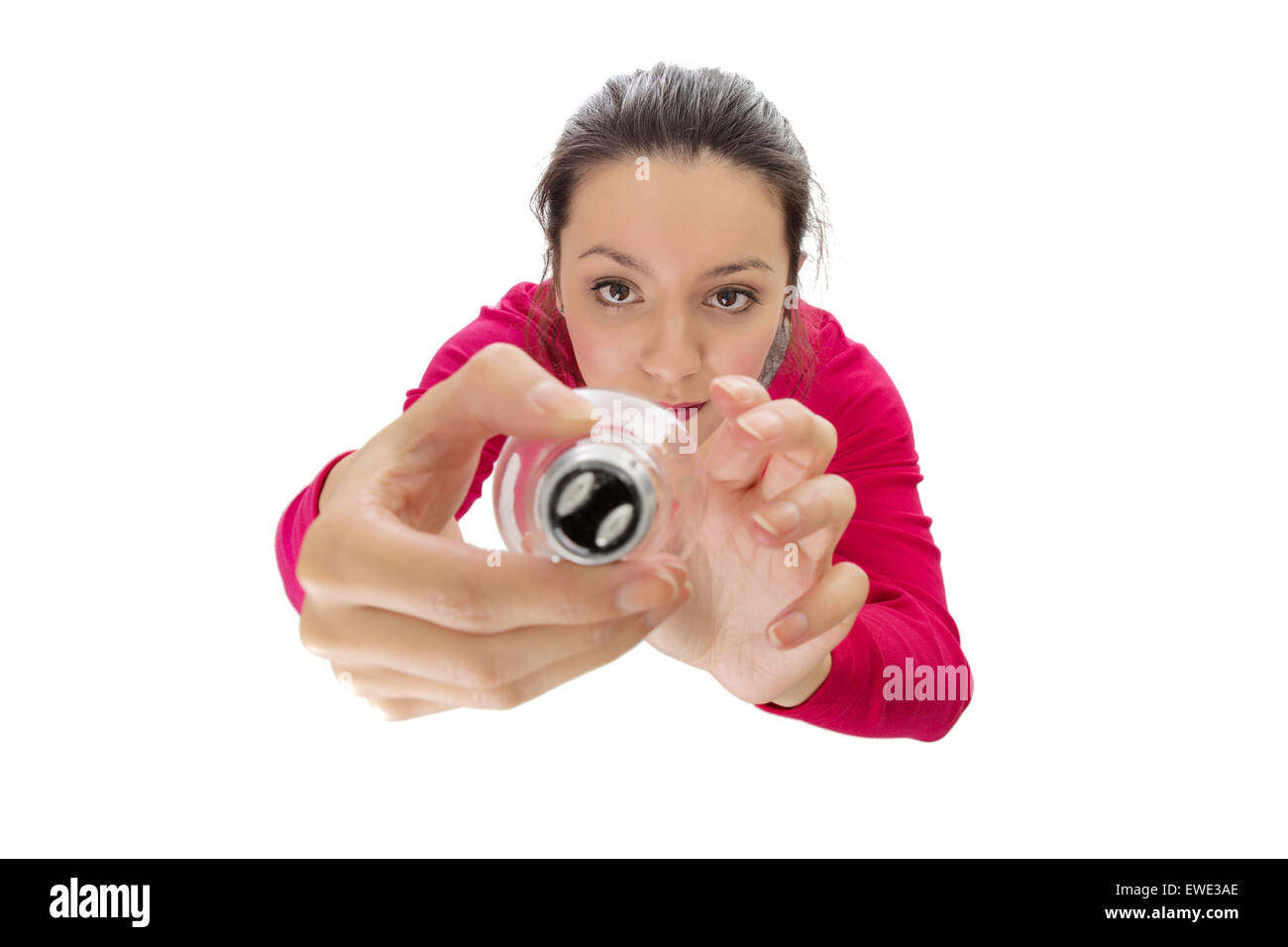 woman changing a light bulb shot from a birds eye view looking down ...