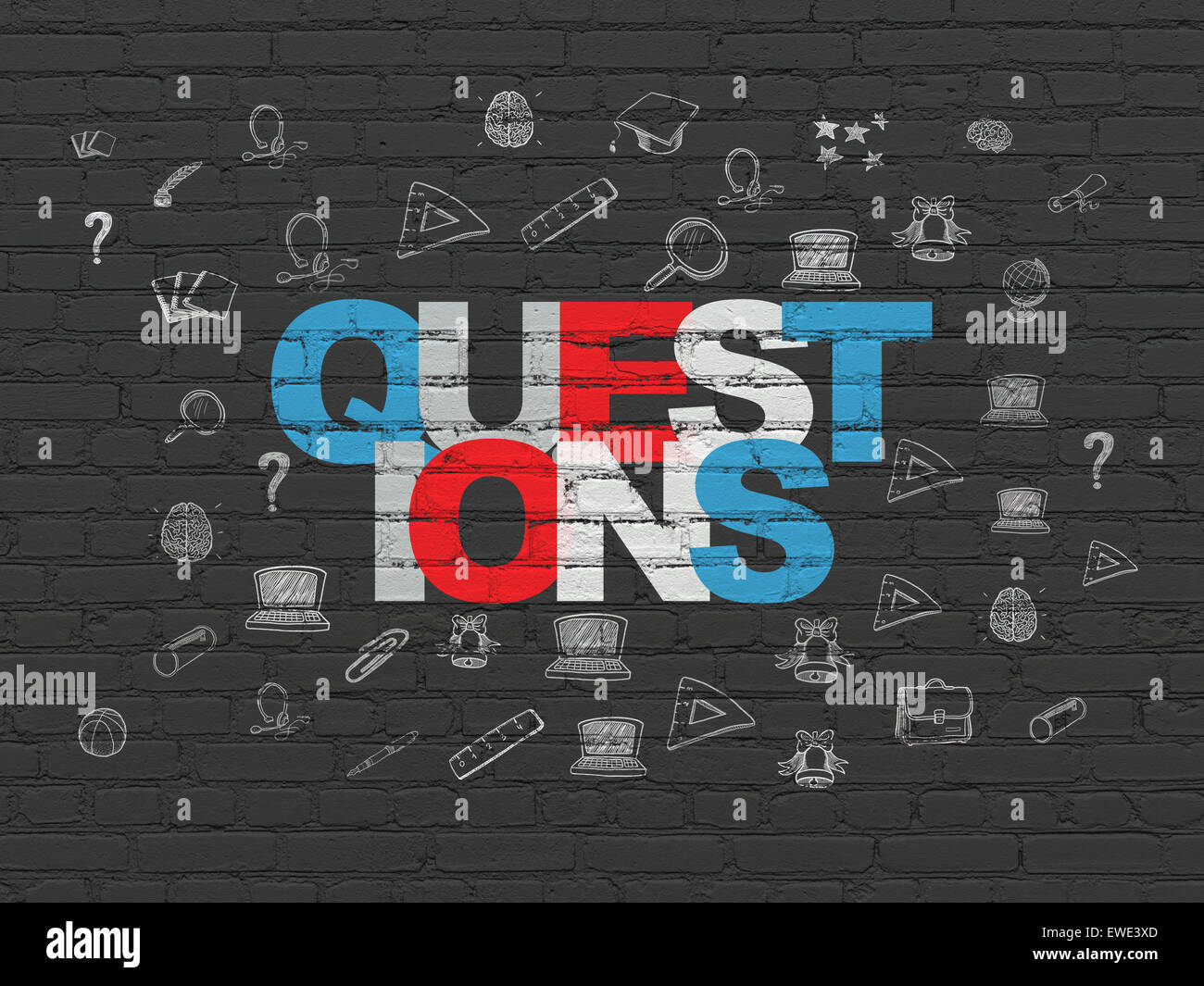 Studying concept: Questions on wall background Stock Photo - Alamy