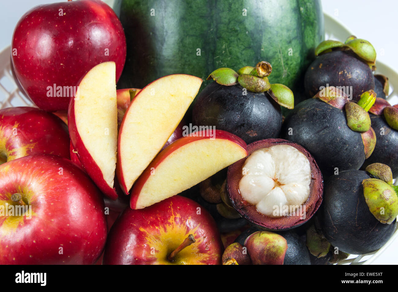 Western fruit (red apple) and Eastern fruit (Watermelon and Mangosteen ...