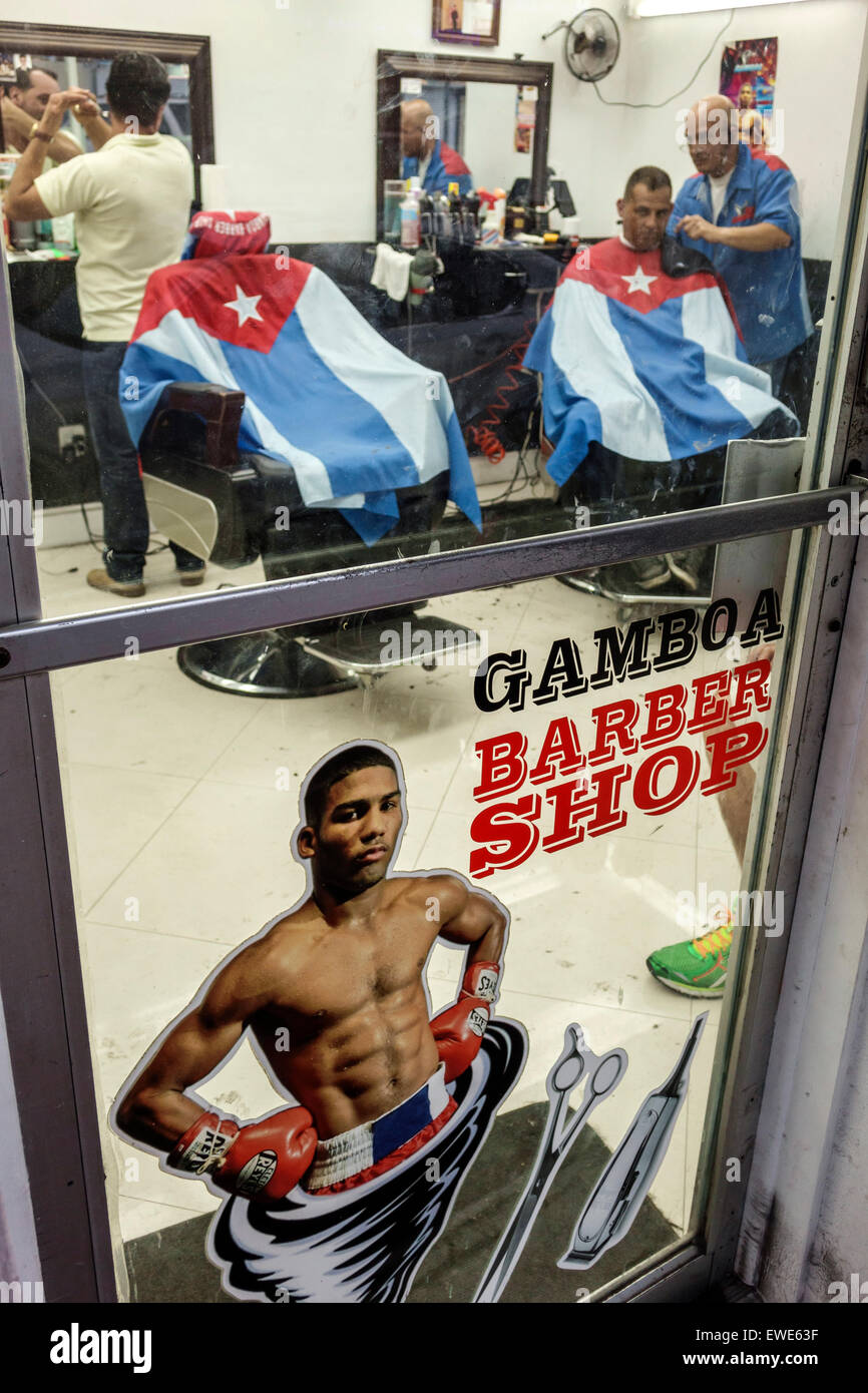 Miami Florida,Little Havana,Gamboa Barber Shop,Cuban flag,Hispanic man ...