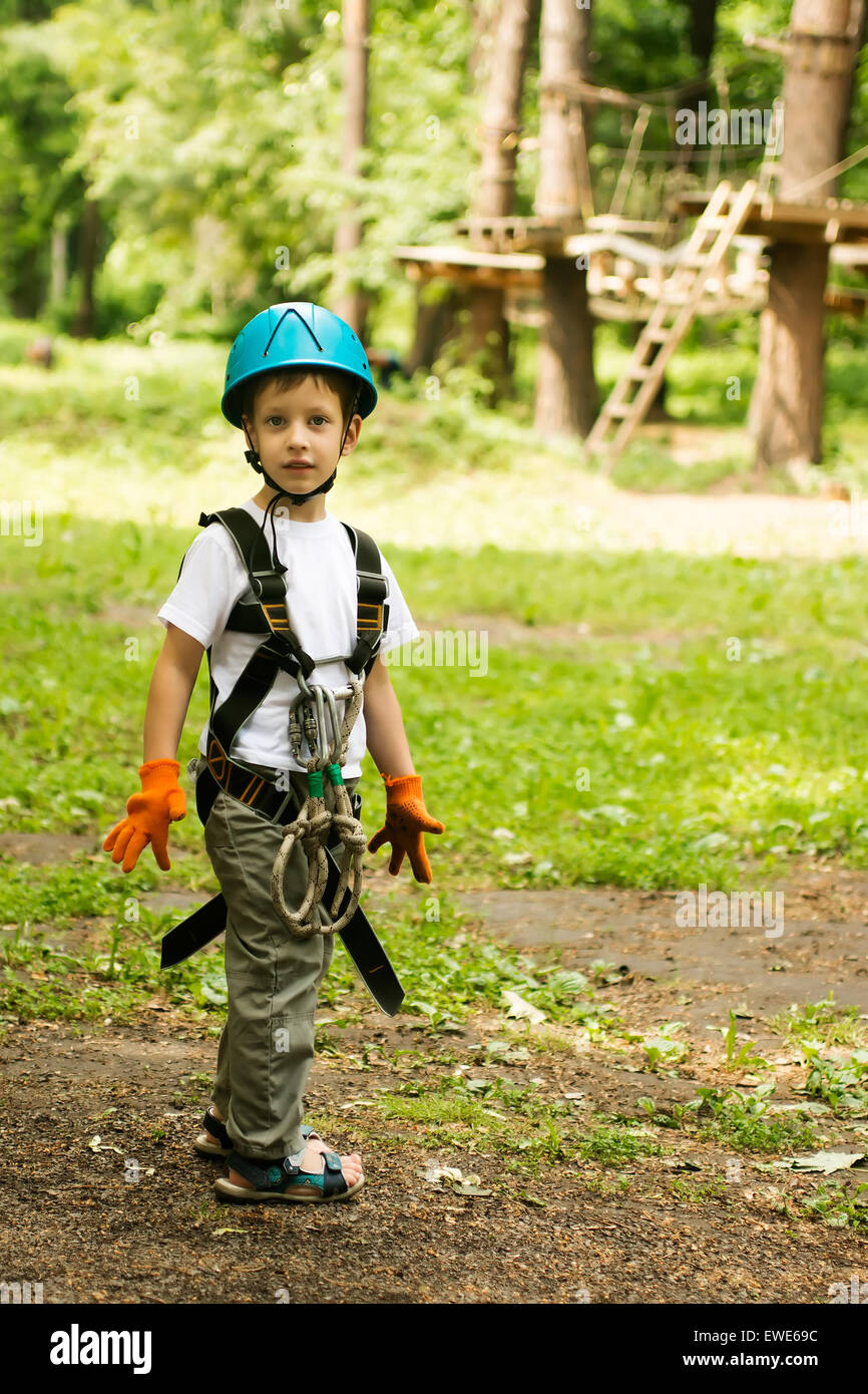 Five year boy on rope-way in forest Stock Photo - Alamy