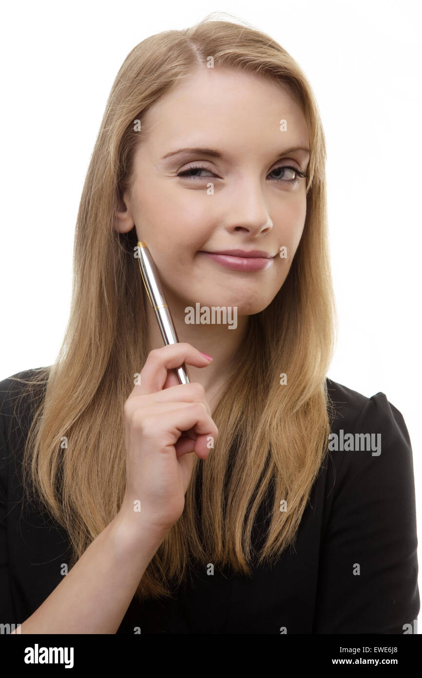 happy woman holding a pen deep in thought Stock Photo - Alamy