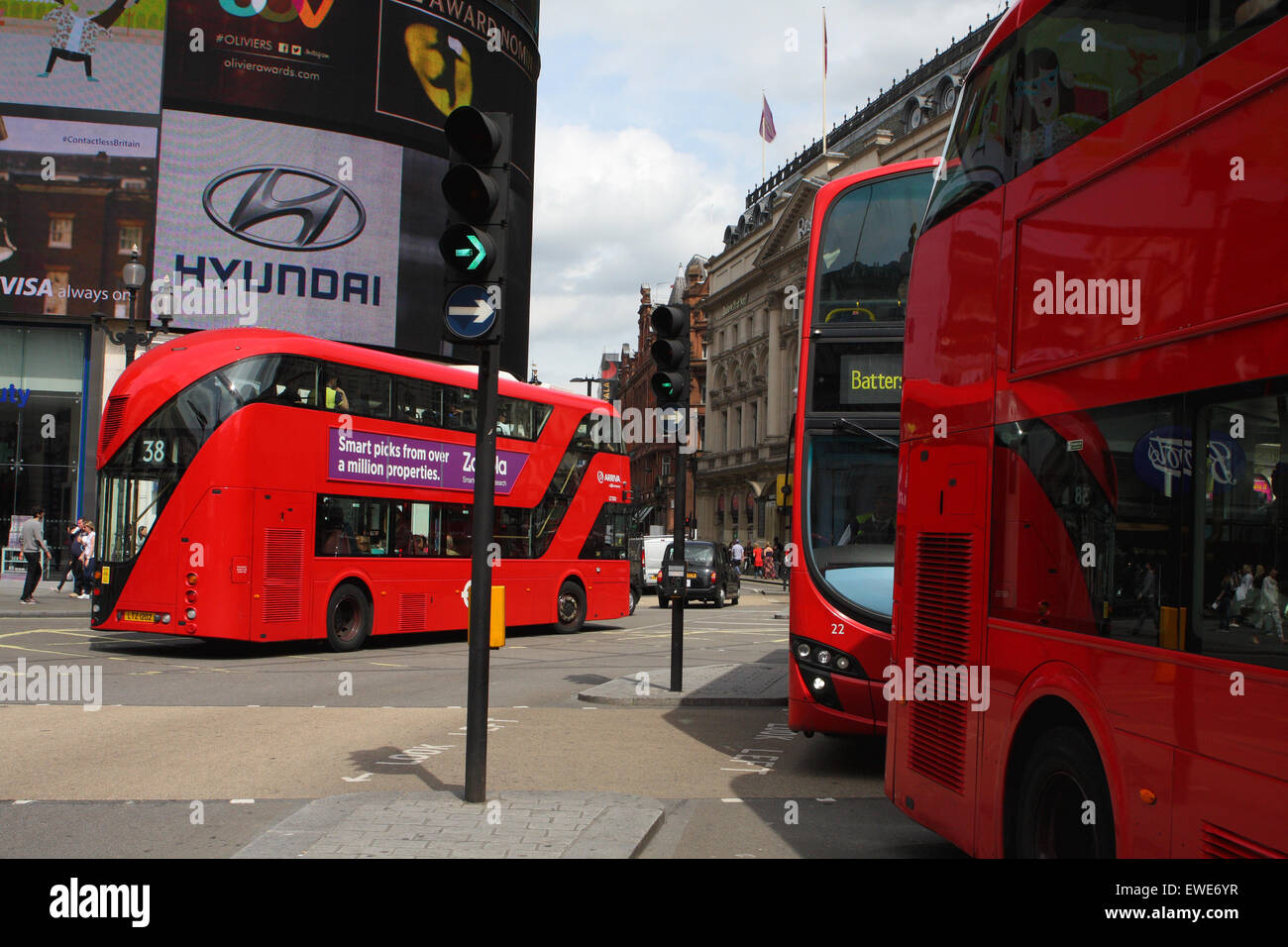 Red double decker buses in Piccadilly, London, England Stock Photo - Alamy