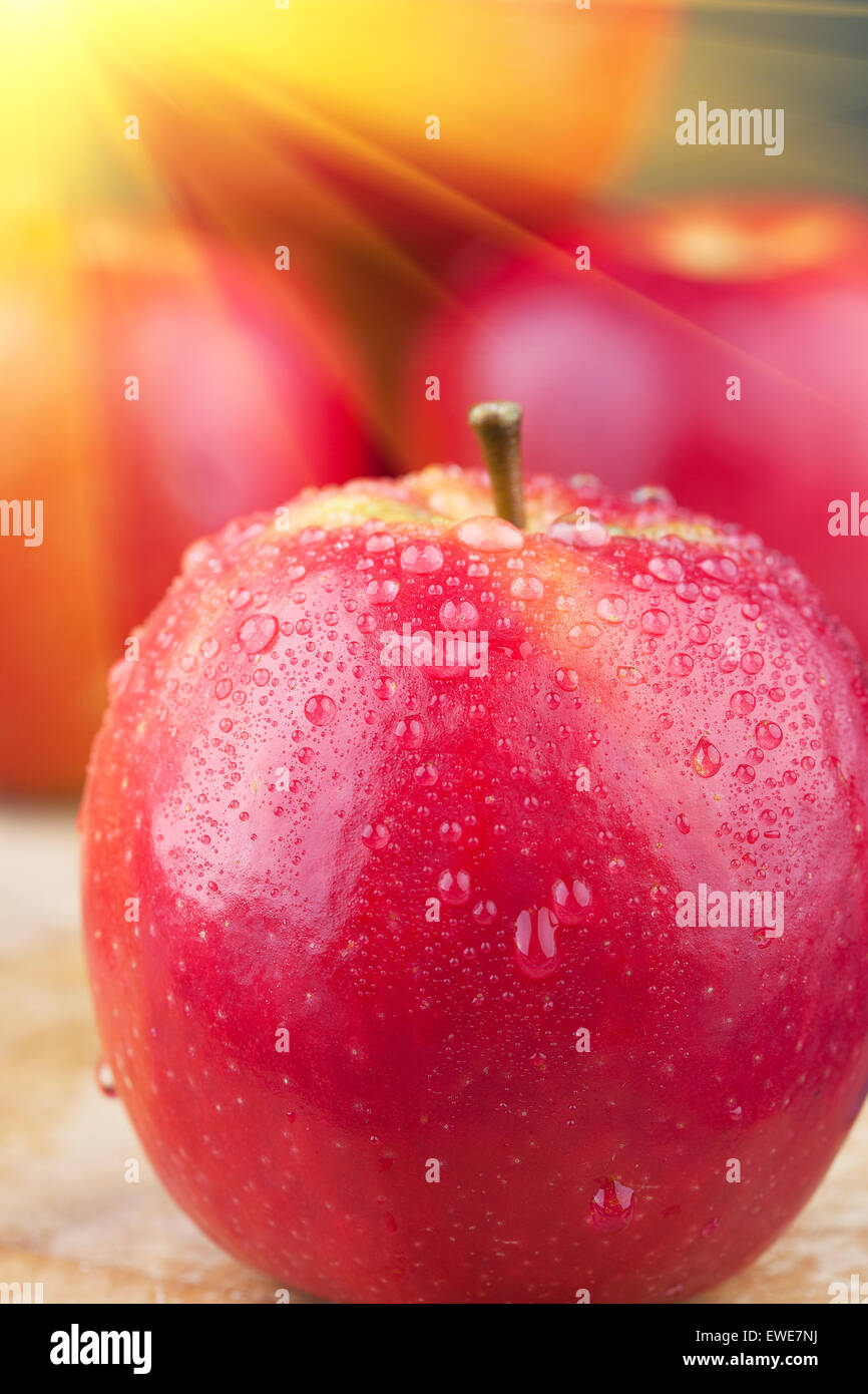 Red apple extreme closeup with flare Stock Photo - Alamy