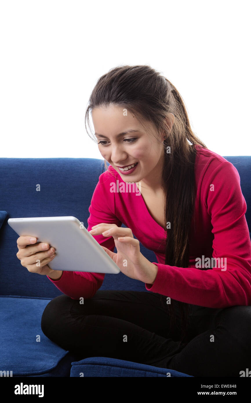 woman sitting on a sofa using a tablet Stock Photo - Alamy