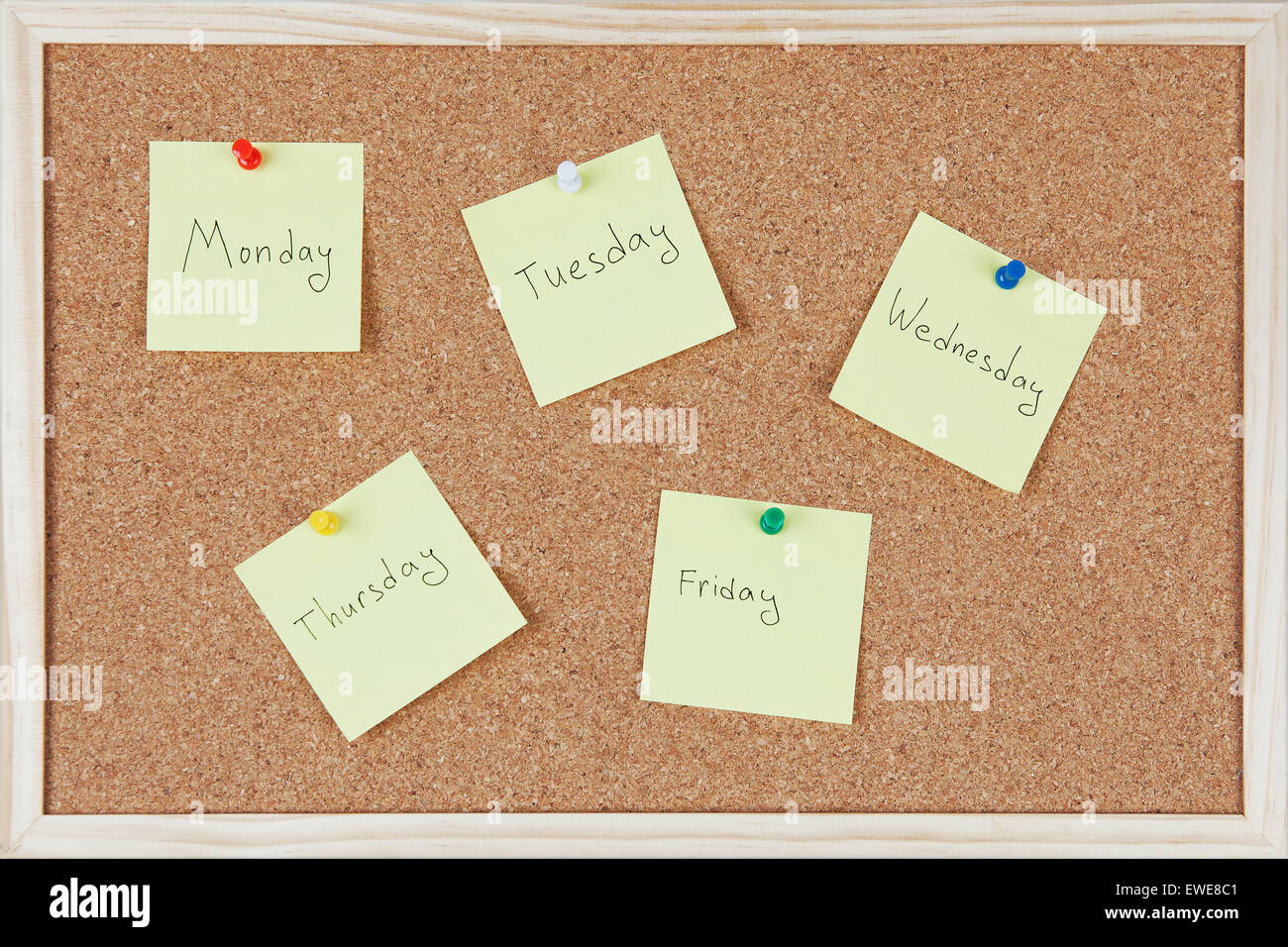 Post-it notes with weekdays sticked on corkboard Stock Photo - Alamy