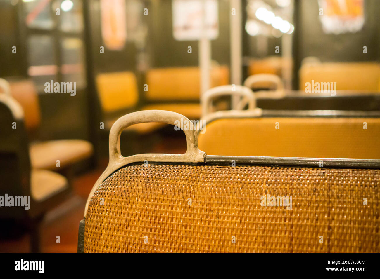 Iconic rattan seats and handholds on a BMT D-Type Triplex train, in use ...