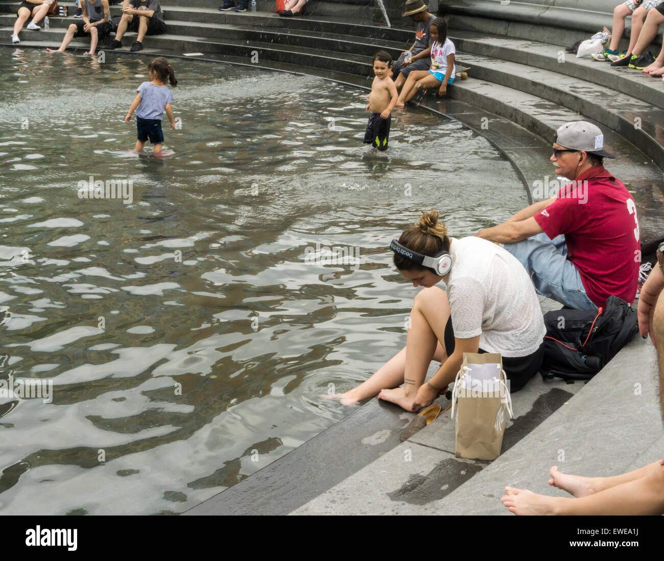 Sweltering New Yorkers and visitors dip into fountains, such as the one ...
