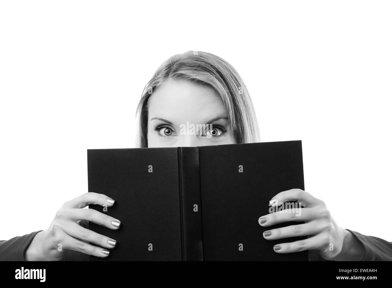 woman reading a hard back book Stock Photo - Alamy