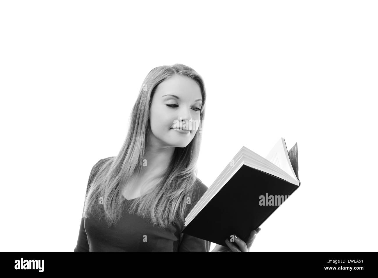 woman reading a hard back book Stock Photo - Alamy