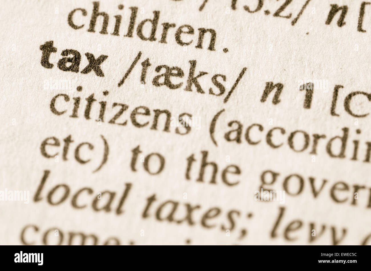 Definition of word tax in dictionary Stock Photo - Alamy