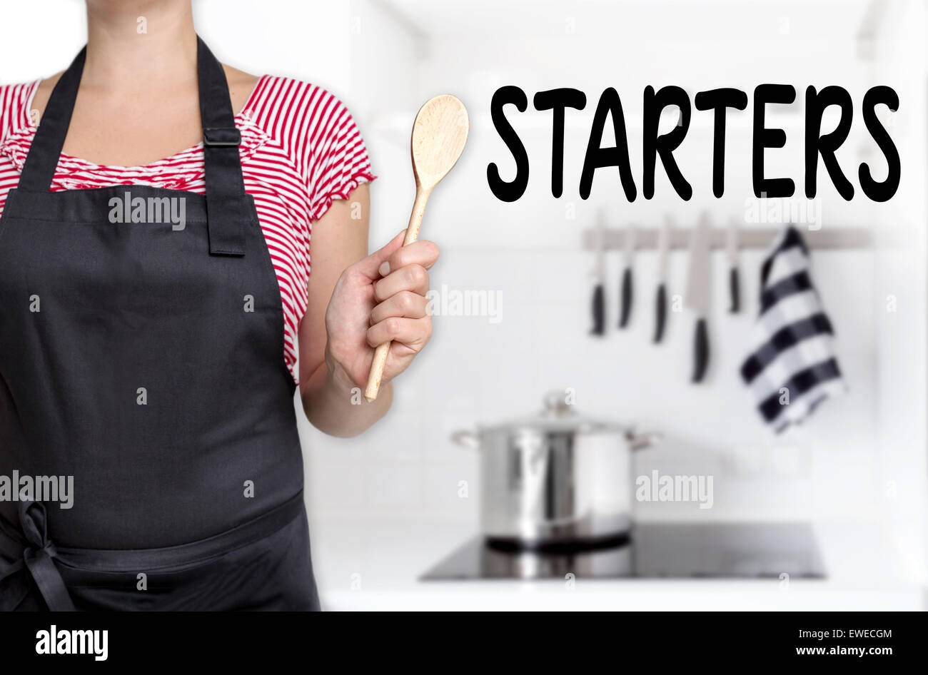 starters cook holding wooden spoon background Stock Photo - Alamy