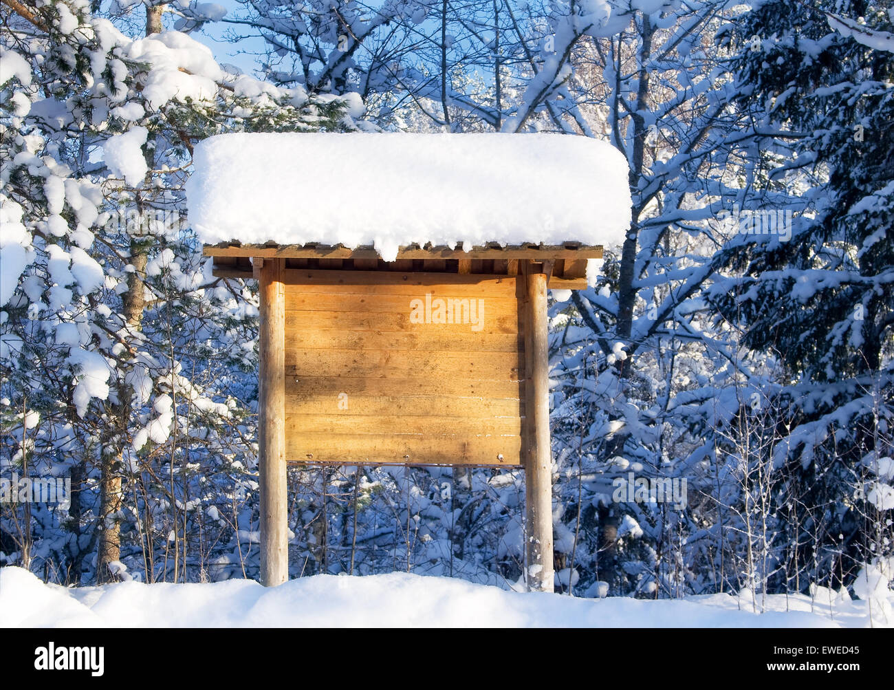 Information sign in winter landscape Stock Photo - Alamy