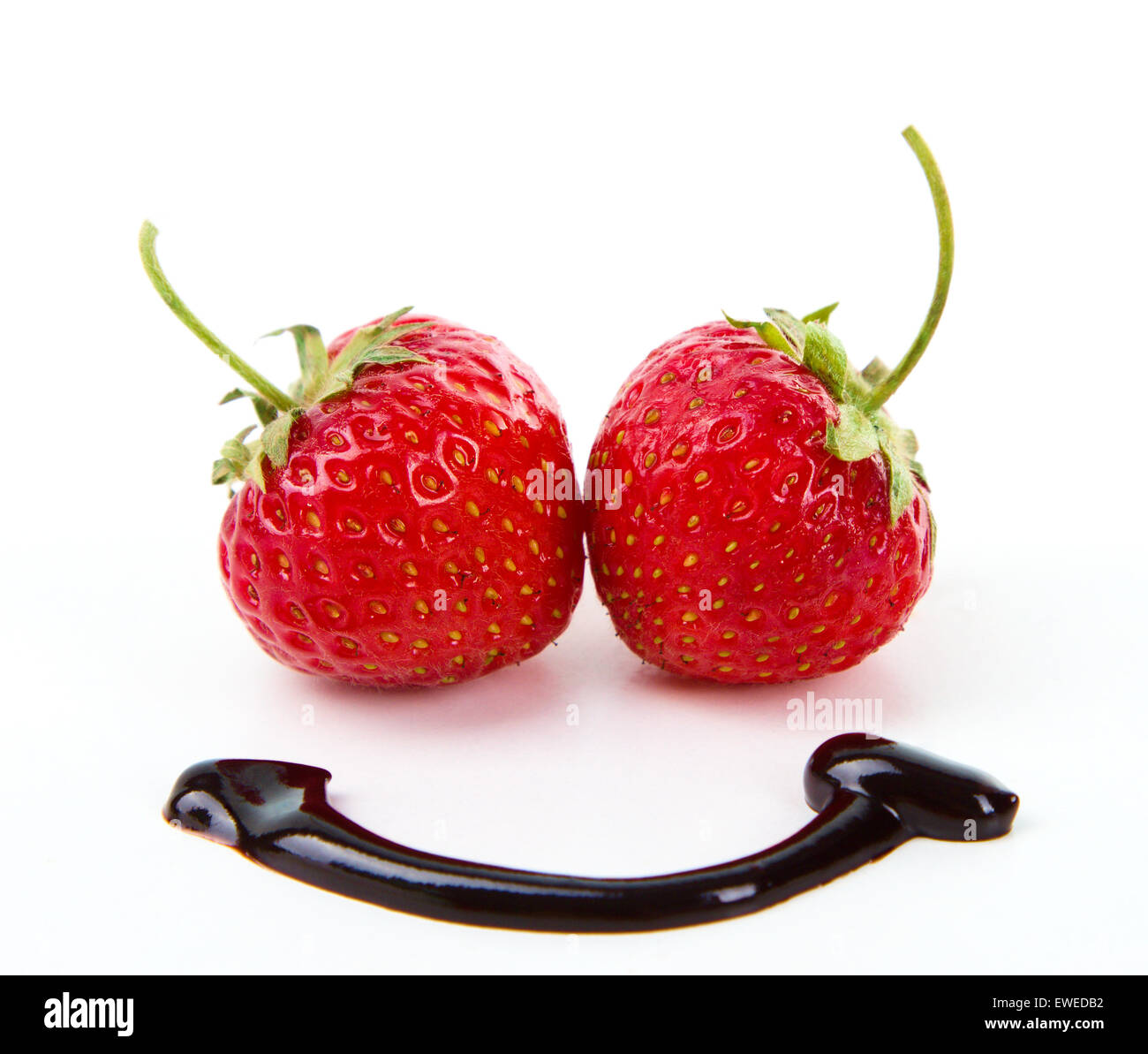 Fresh sweet strawberry with chocolate smile isolated on white ...