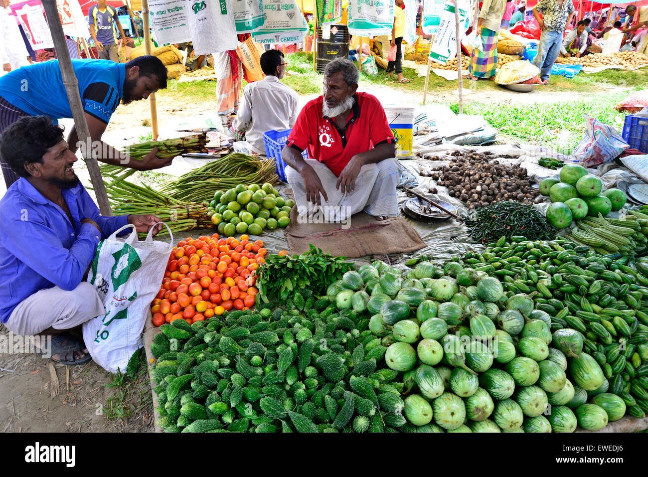 A shopkeeper waiting for customers to sale vegetables at Kaikkarateke ...