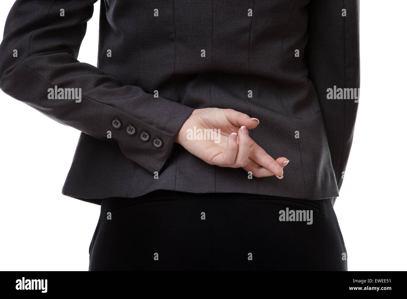 Woman crossing fingers behind back hi-res stock photography and images ...