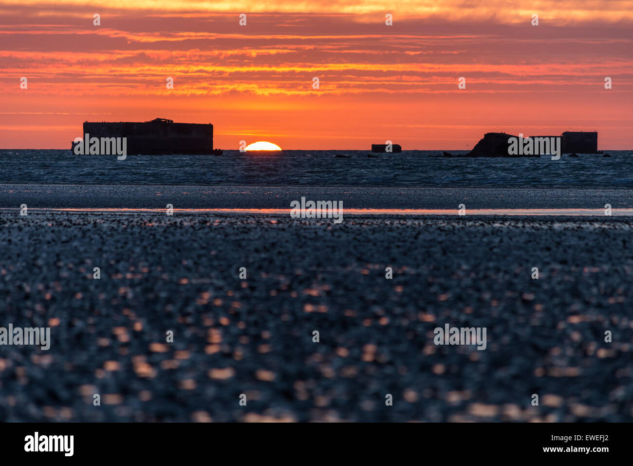 Sunset over 'Port Winston' The Mulberry Harbour, Arromanche, Normandy ...