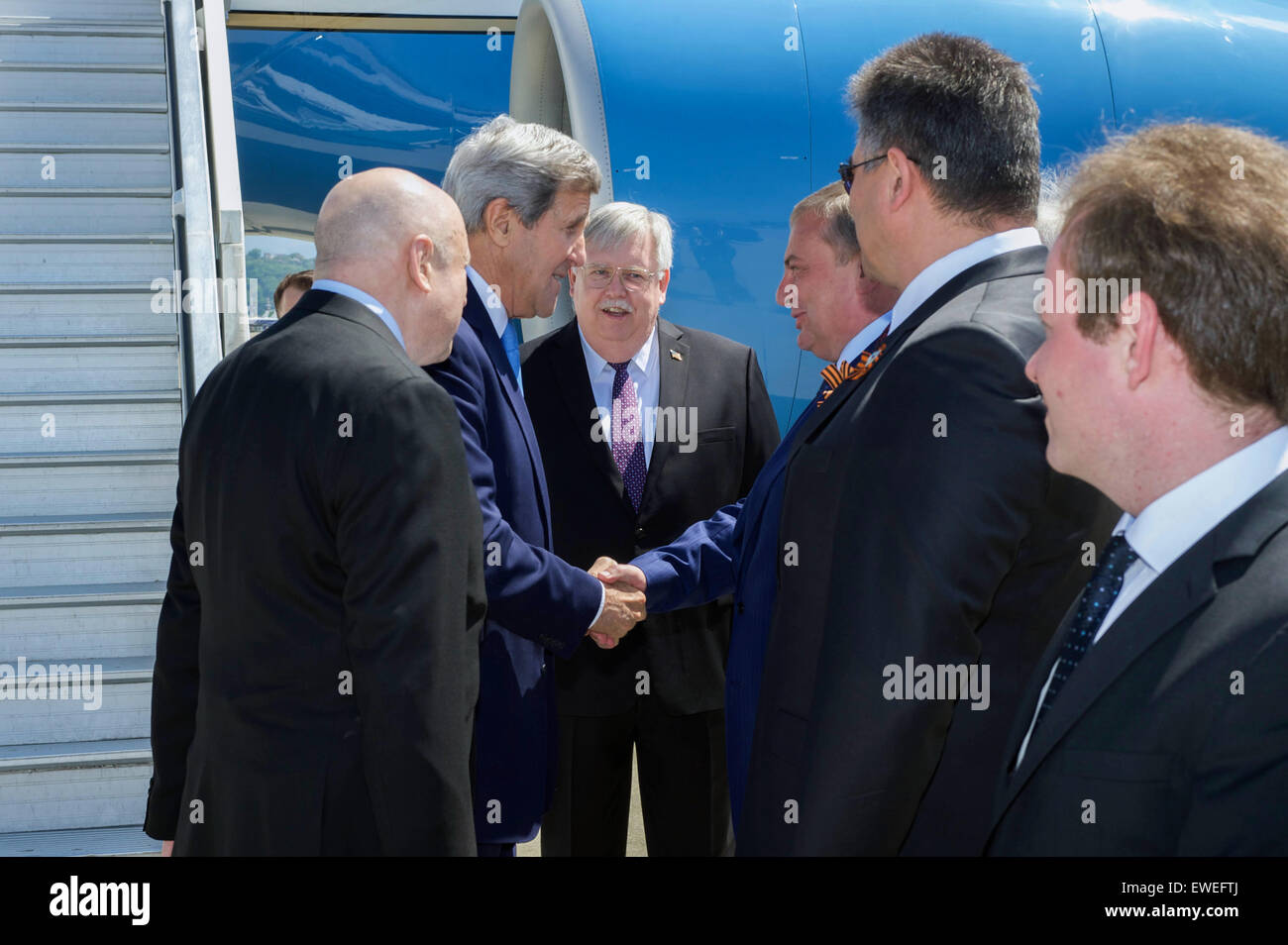 U.S. Ambassador to Russia John Tefft looks on as U.S. Secretary of ...