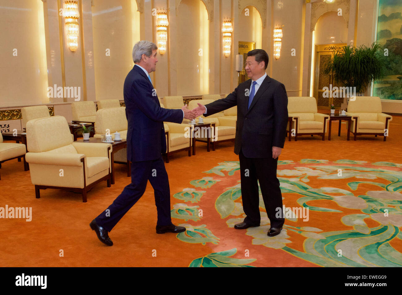 Chinese President Xi Jinping greets U.S. Secretary of State John Kerry ...