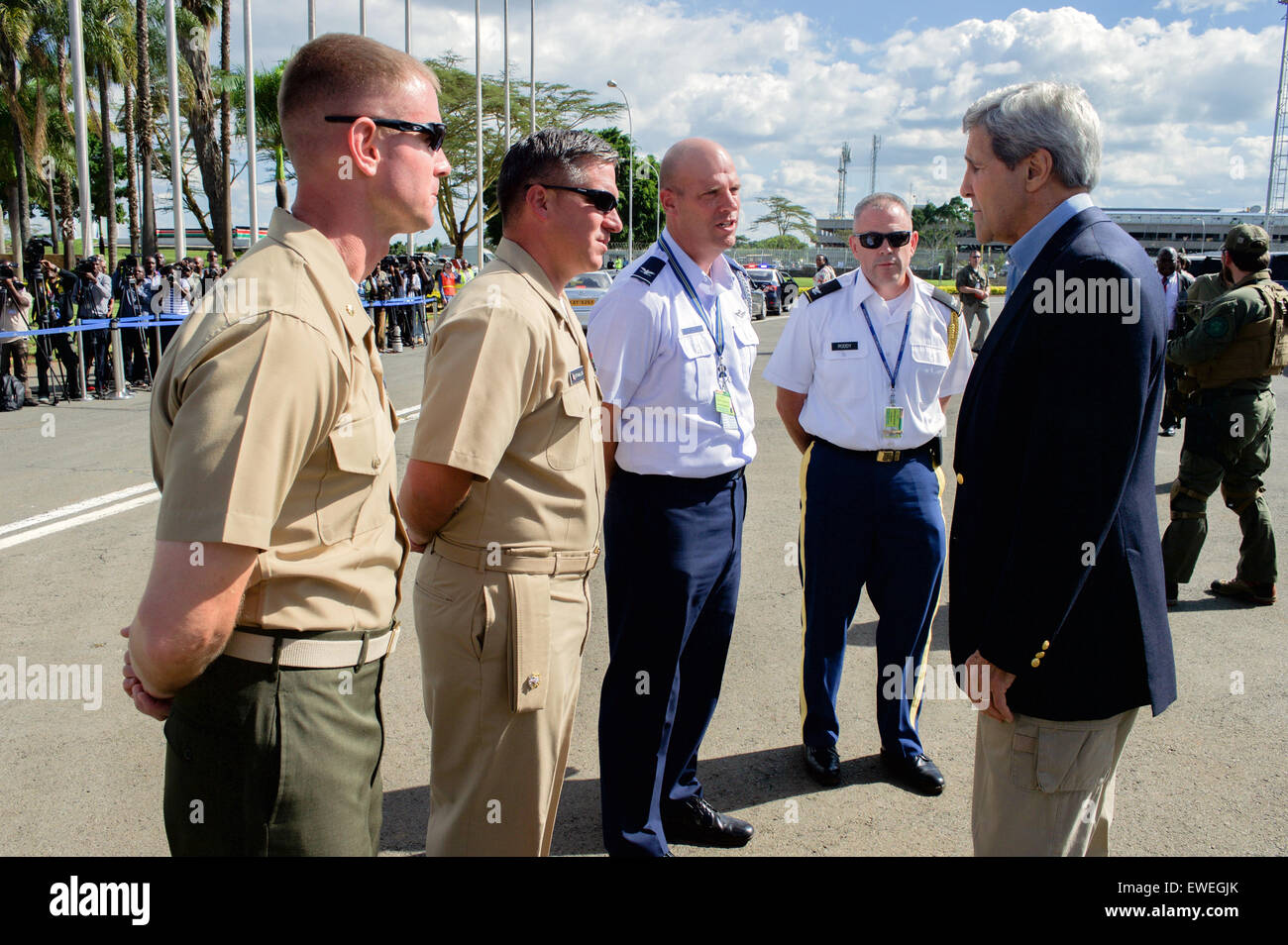 U.S. Secretary of State John Kerry speaks with member of the U.S ...