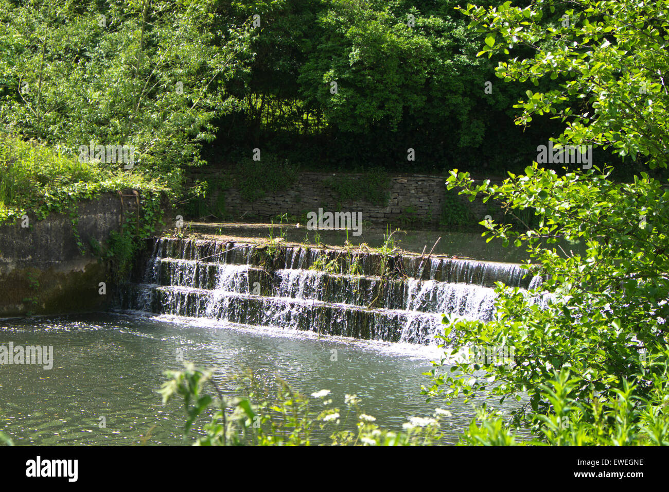 Malmesbury a small town in Wiltshire England. The weir on the River ...