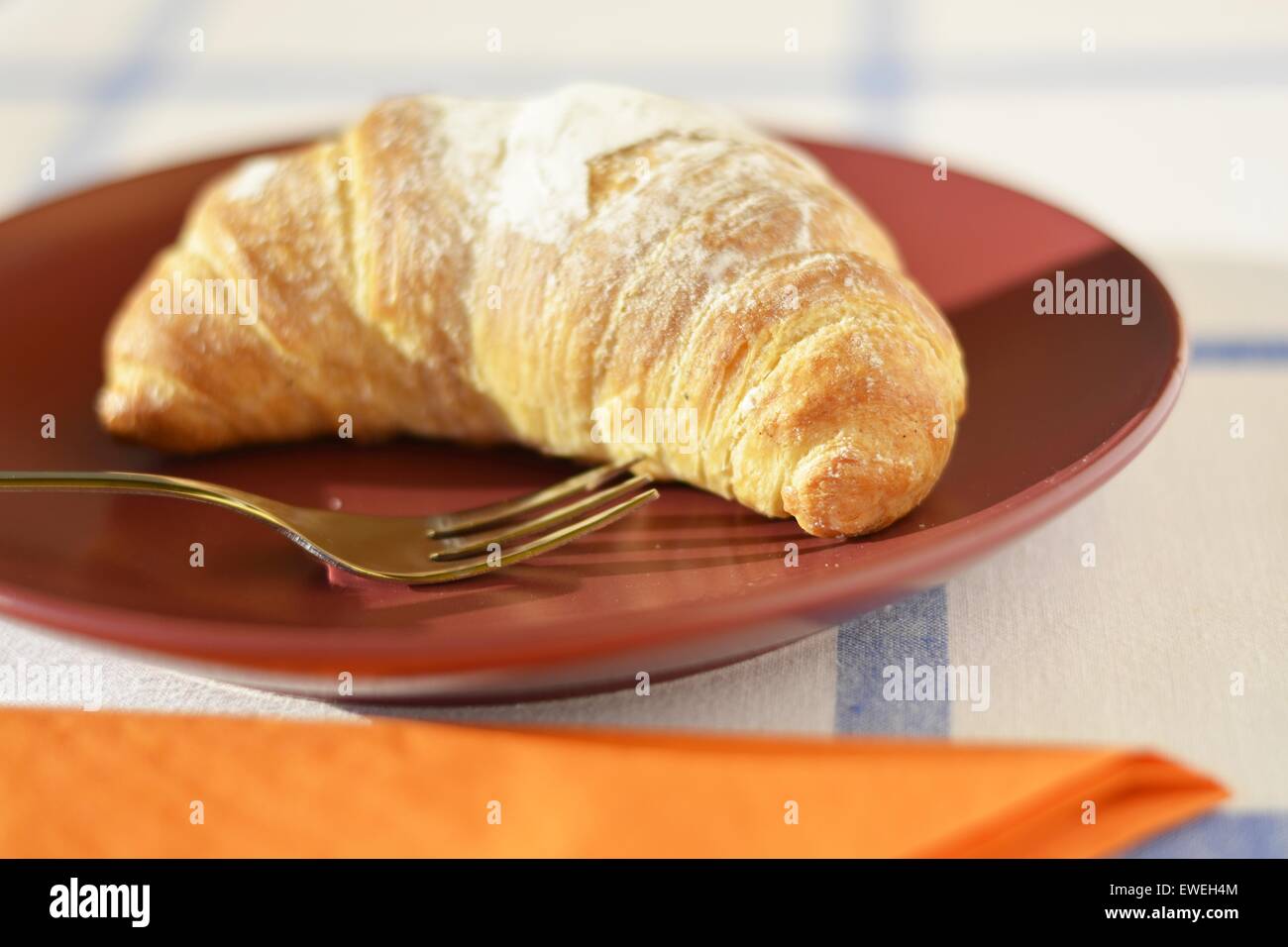 Croissant on a plate Stock Photo - Alamy