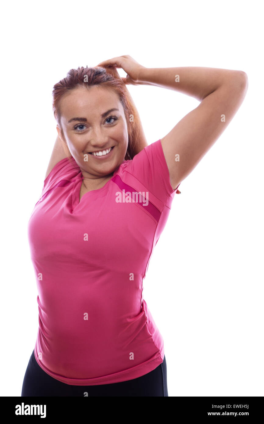 Keep fit woman stretching her arm before a workout Stock Photo - Alamy