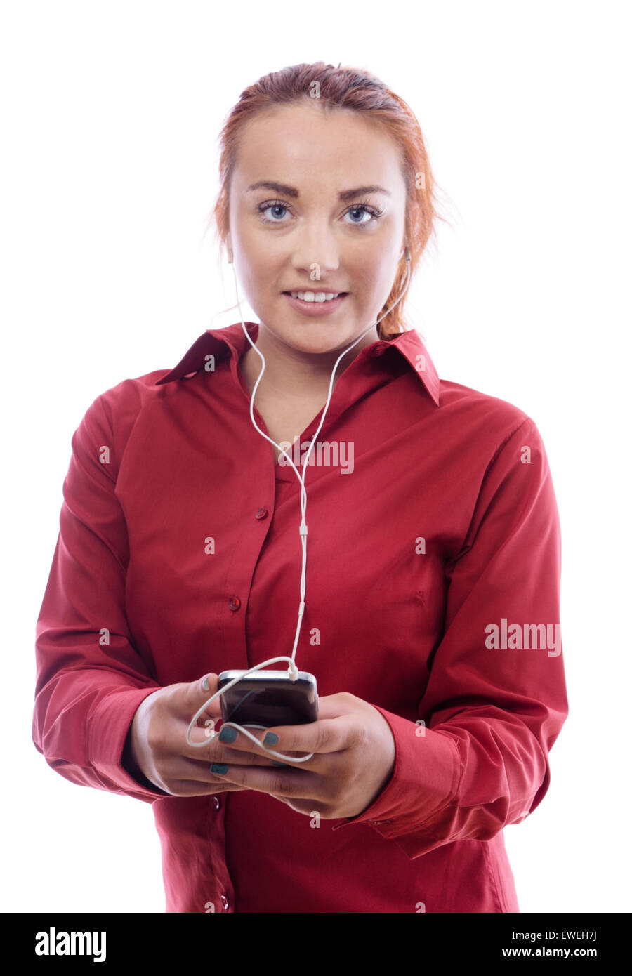 business woman listing to music on her phone Stock Photo - Alamy