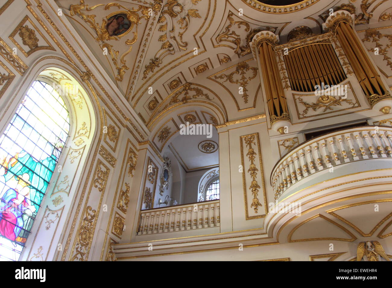 Church Organ gold pipes and Artwork religious painting of the ceiling ...