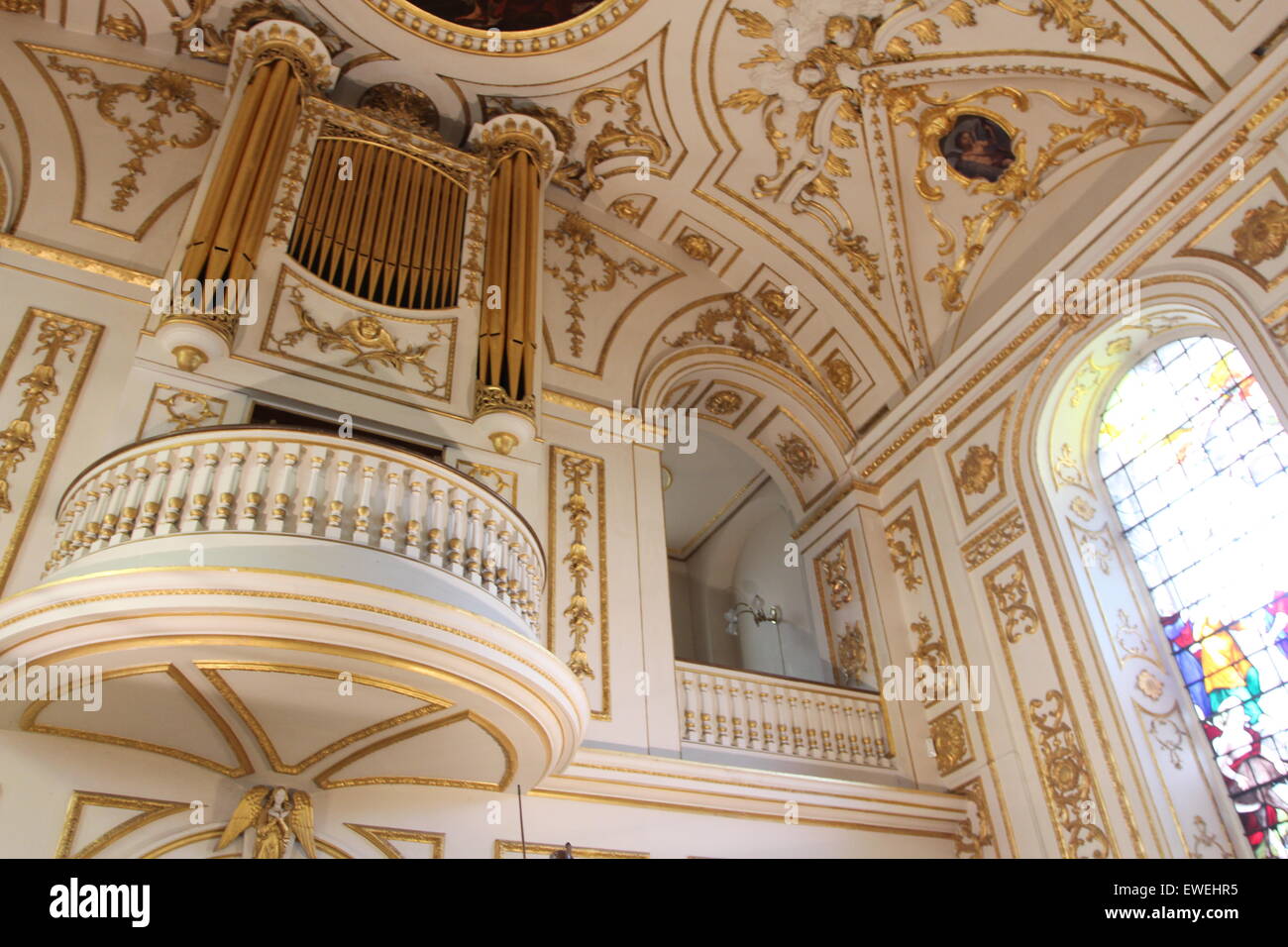 Church Organ gold pipes and Artwork religious painting of the ceiling ...