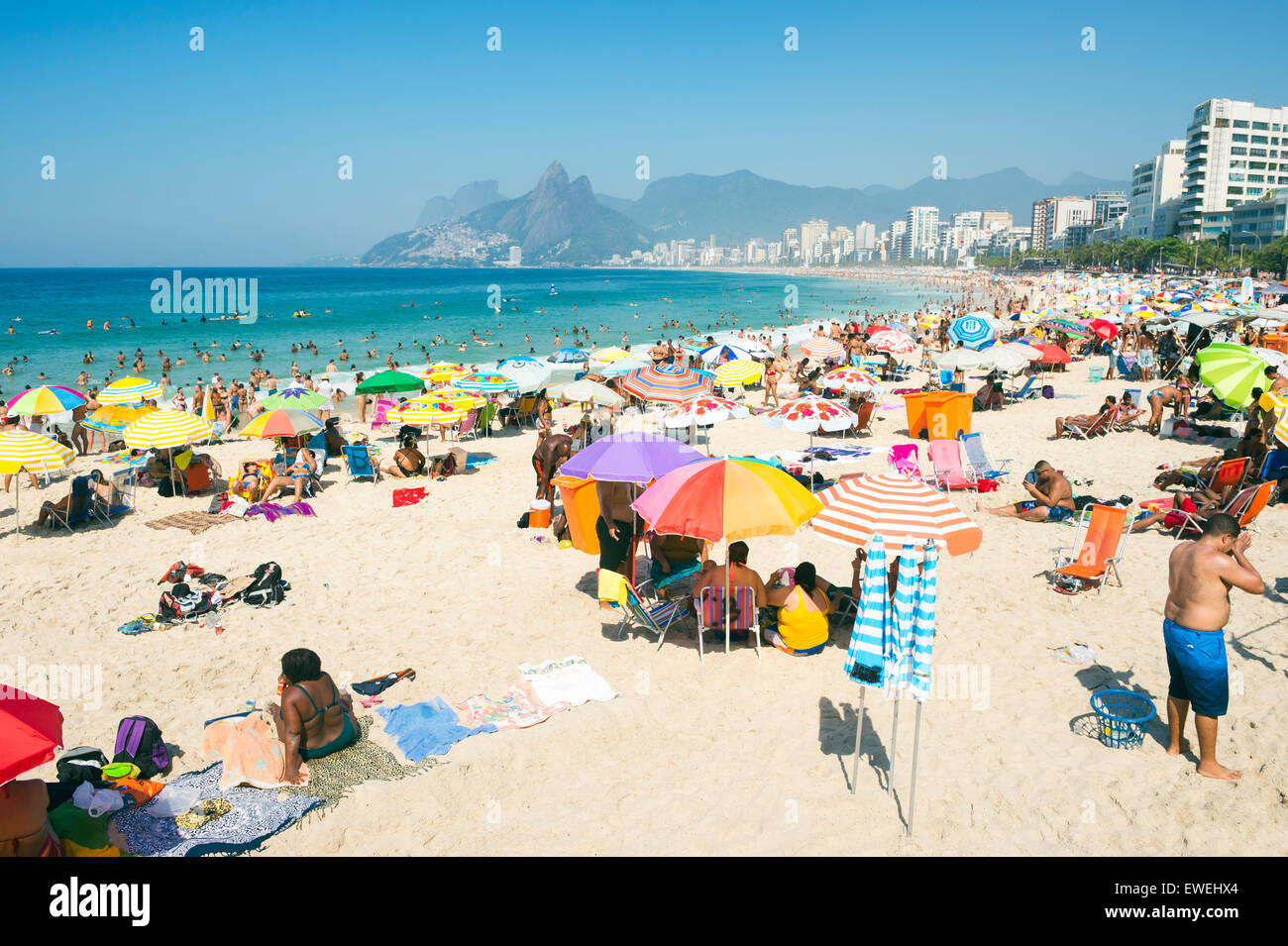RIO DE JANEIRO, BRAZIL - MARCH 01, 2015: Beachgoers relax on Ipanema ...