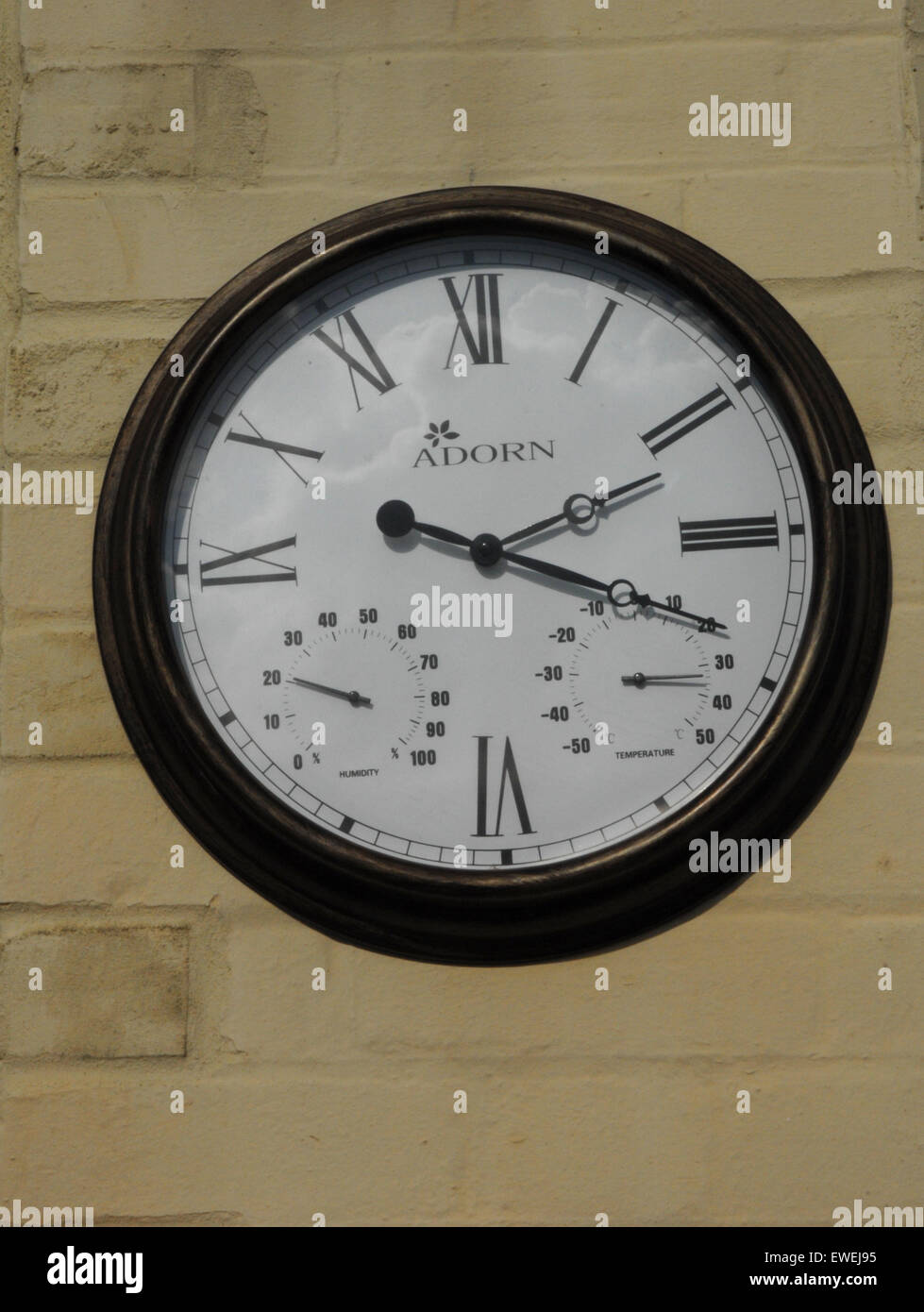 wall clock with thermometer and humidity meter Stock Photo - Alamy