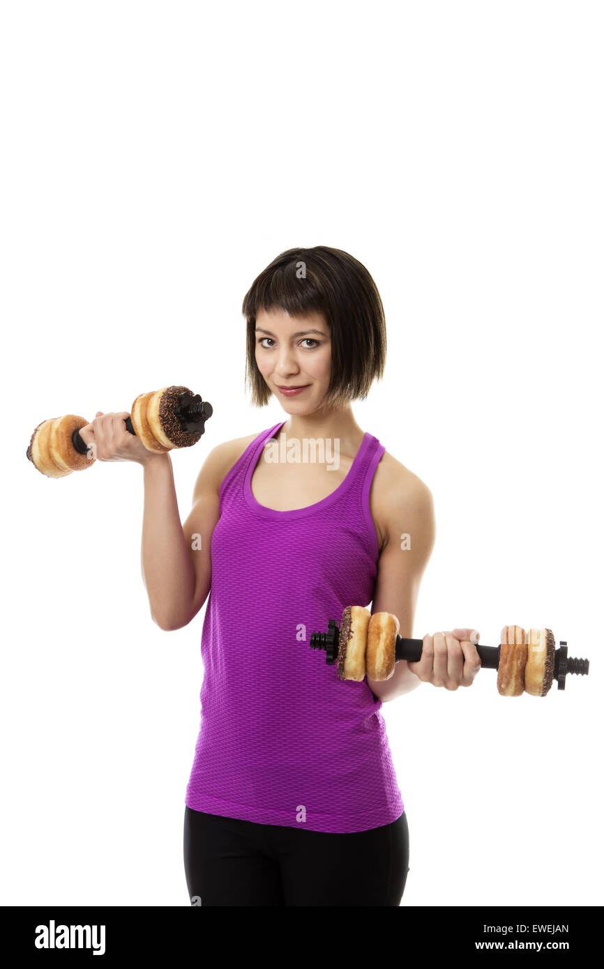 fitness model weight training with dumbbells but instead of real weight ...