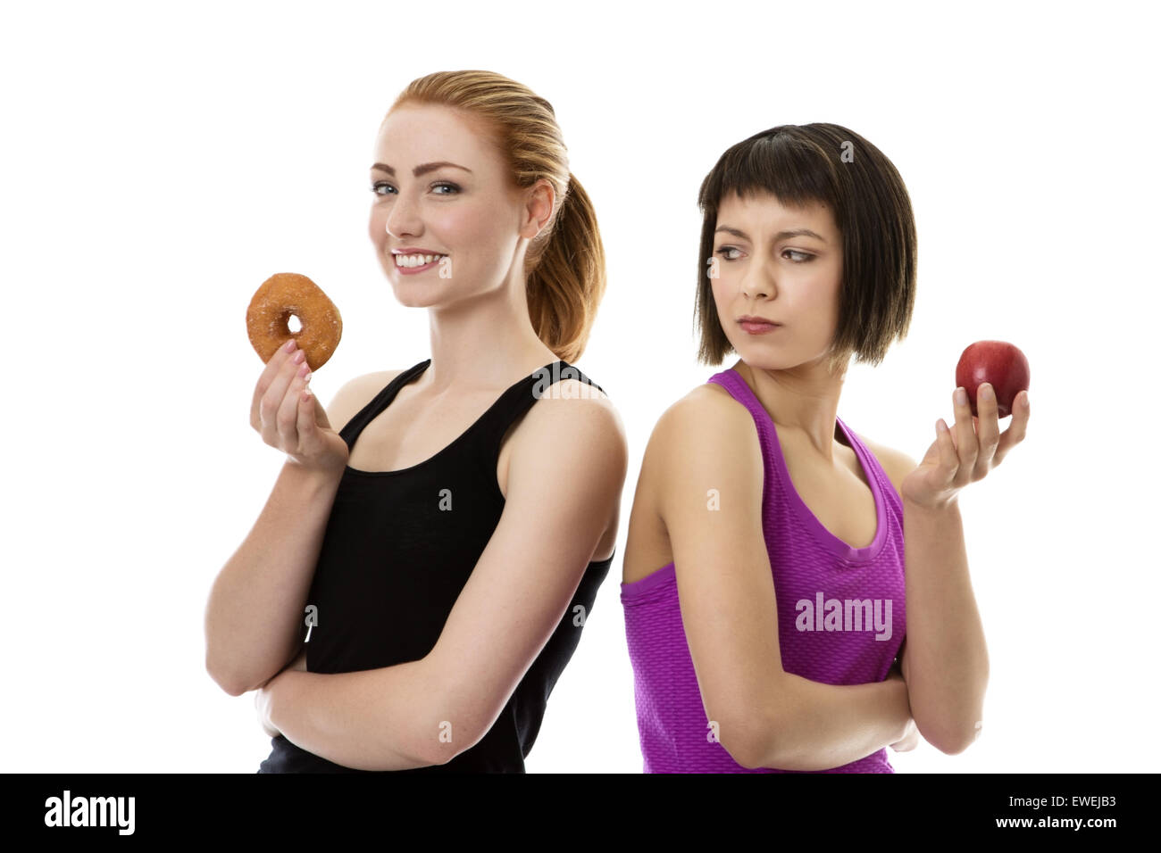 two models wearing gym clothes standing back to back one is holding a ...