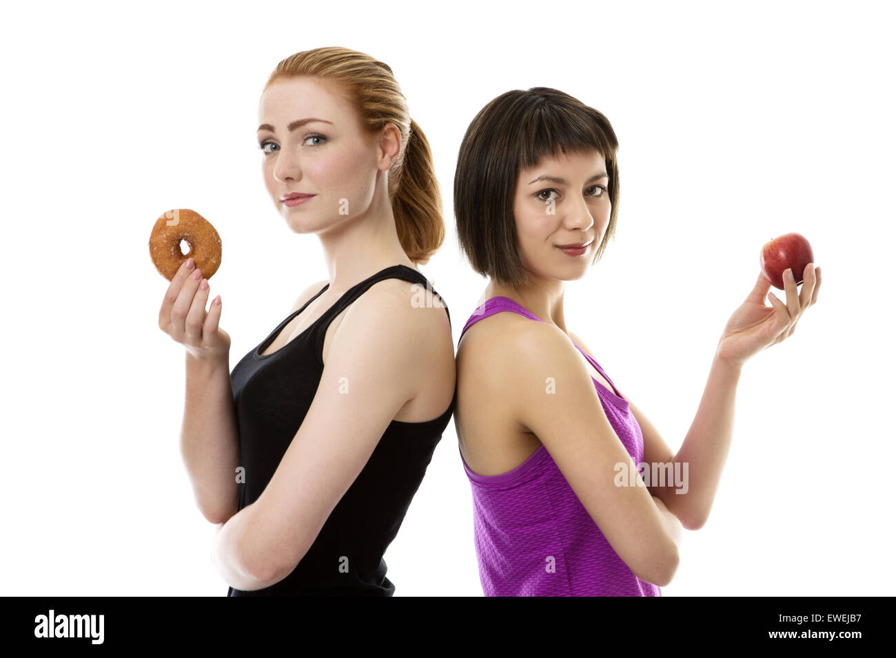 two models wearing gym clothes standing back to back one is holding a ...