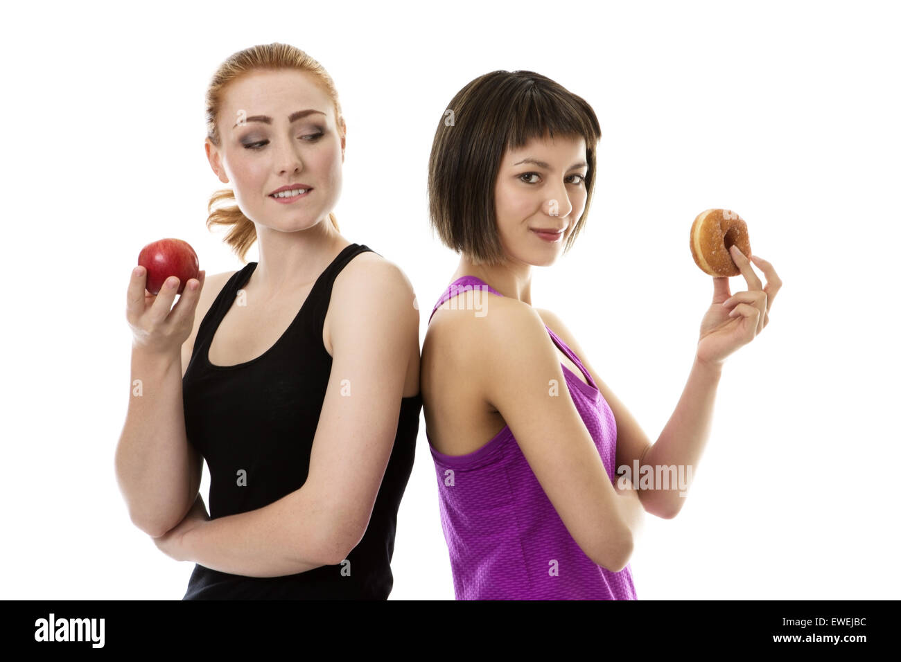 two models wearing gym clothes standing back to back one is holding a ...
