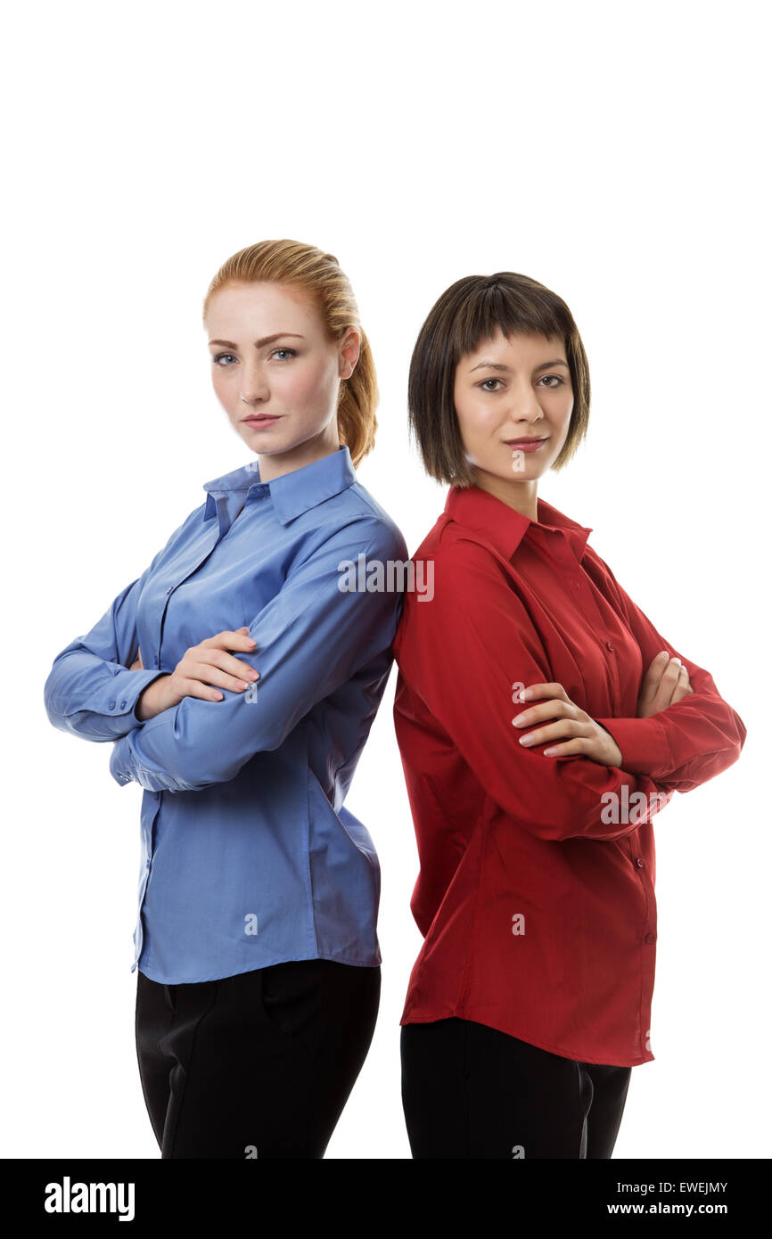 two business woman standing back to back Stock Photo - Alamy
